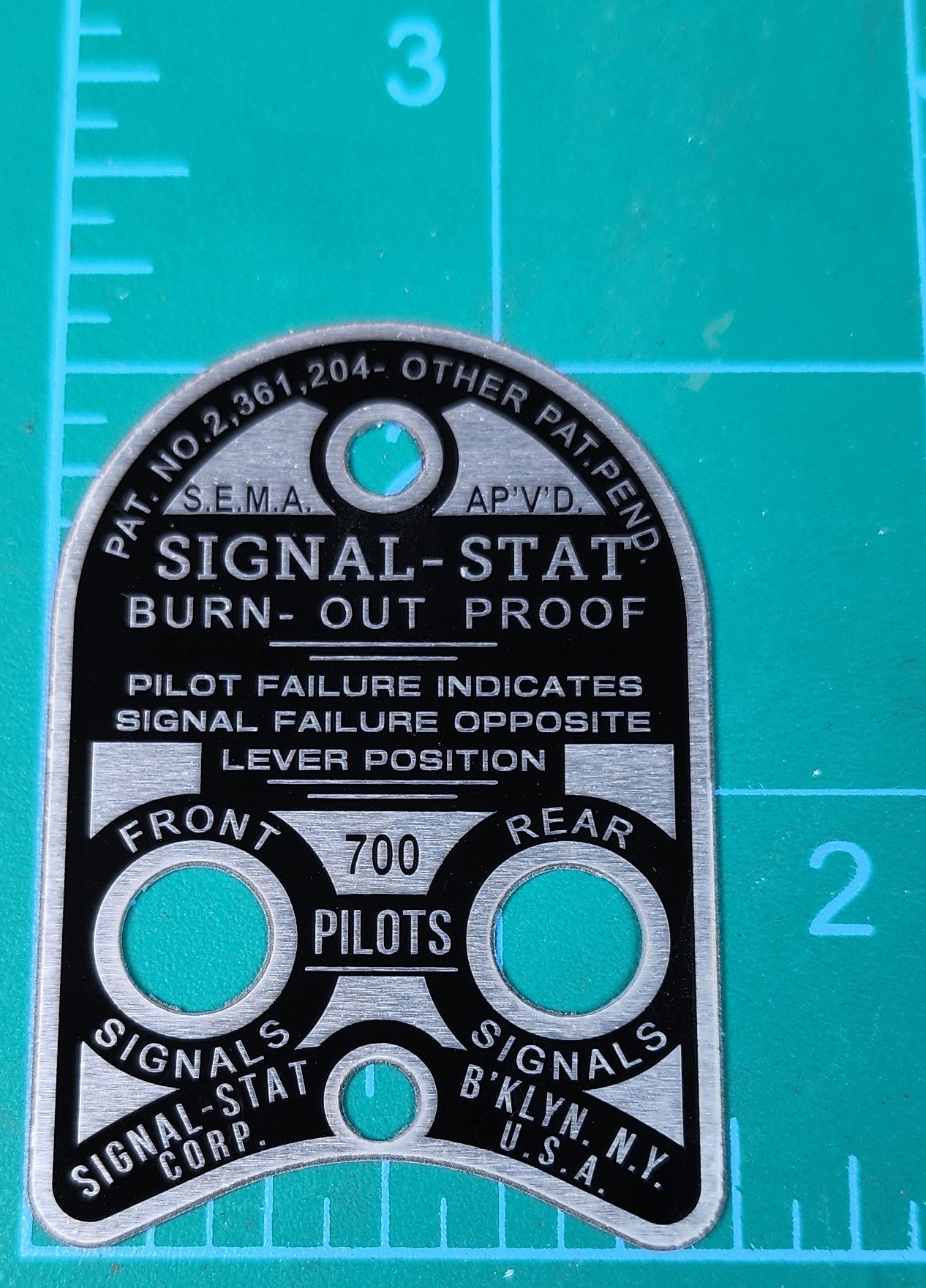 Signal Stat 700 Directional Plate – The Tag Guy